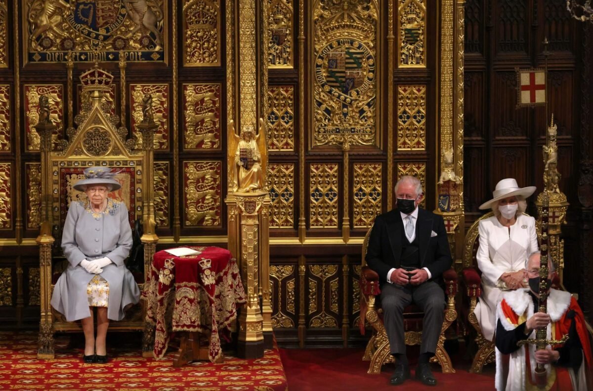 A sad sight: For the first time Queen Elizabeth sits alone on the ...